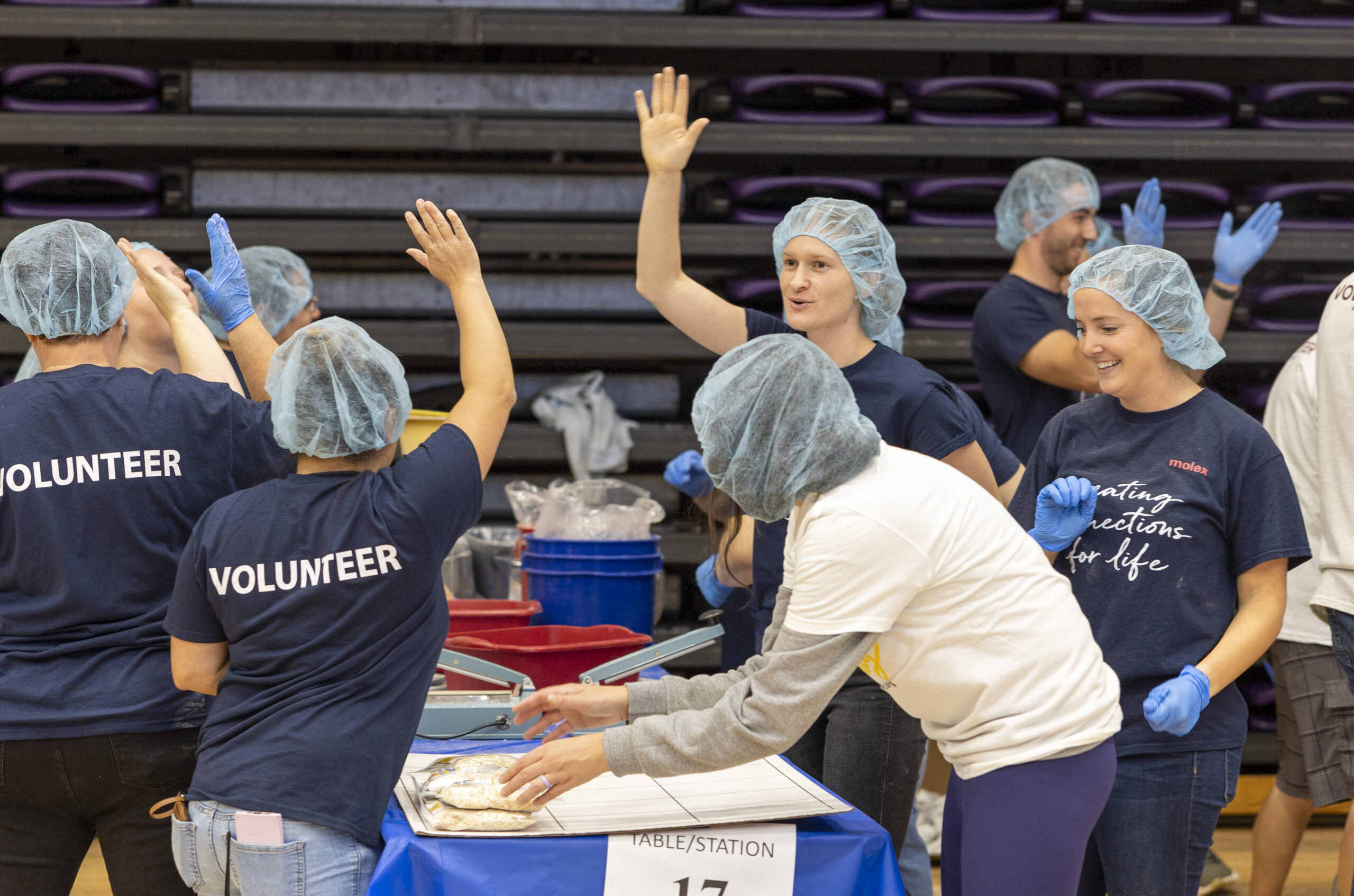 St. Thomas Hosted Meal Packing Event for 9/11 Day of Service - Newsroom | University of St. Thomas
